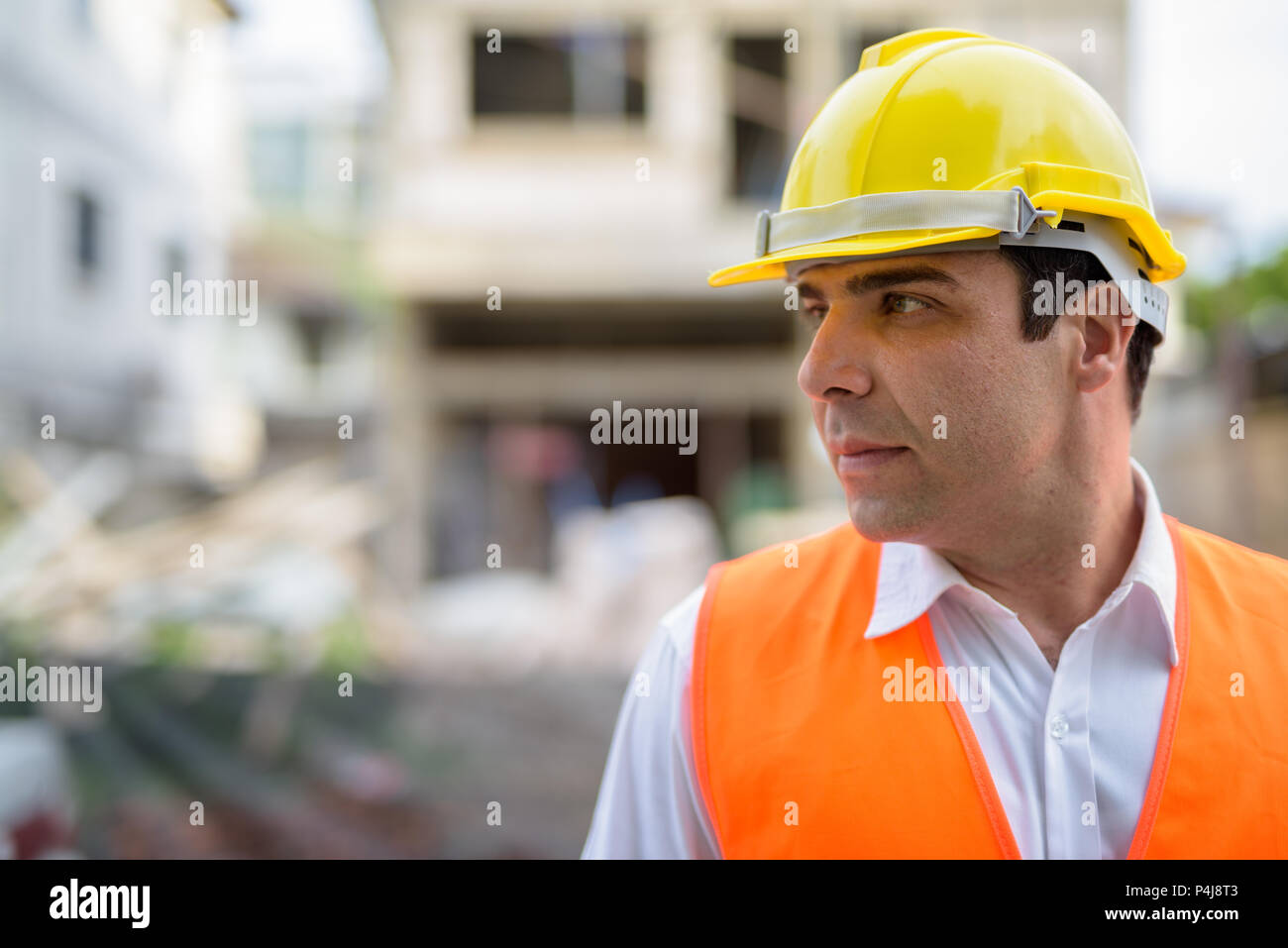 Handsome Persian man construction worker at the construction sit Stock ...