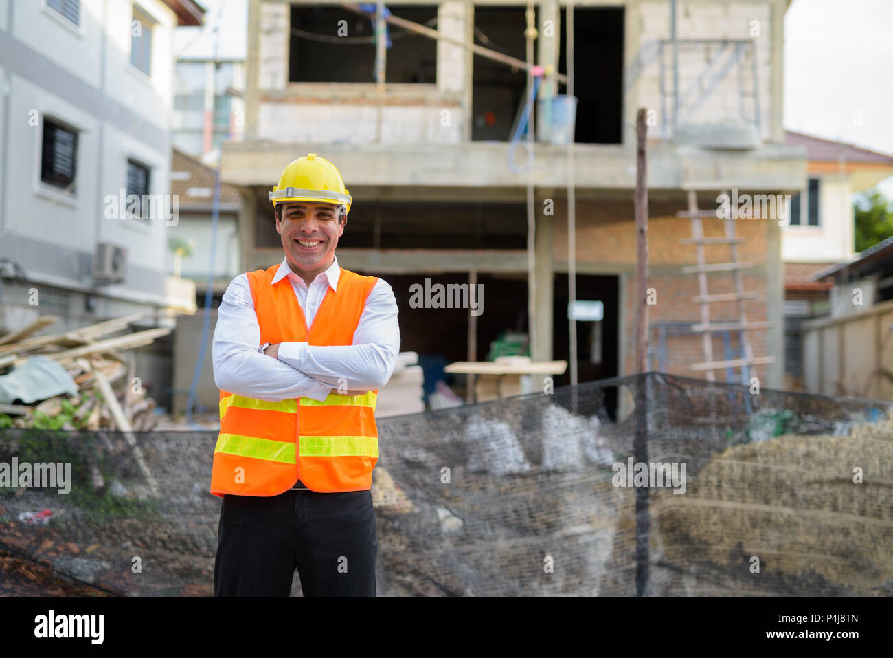 Handsome Persian man construction worker at the construction sit Stock ...