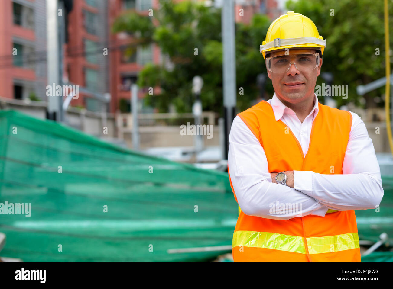 Handsome Persian man construction worker at the construction sit Stock ...