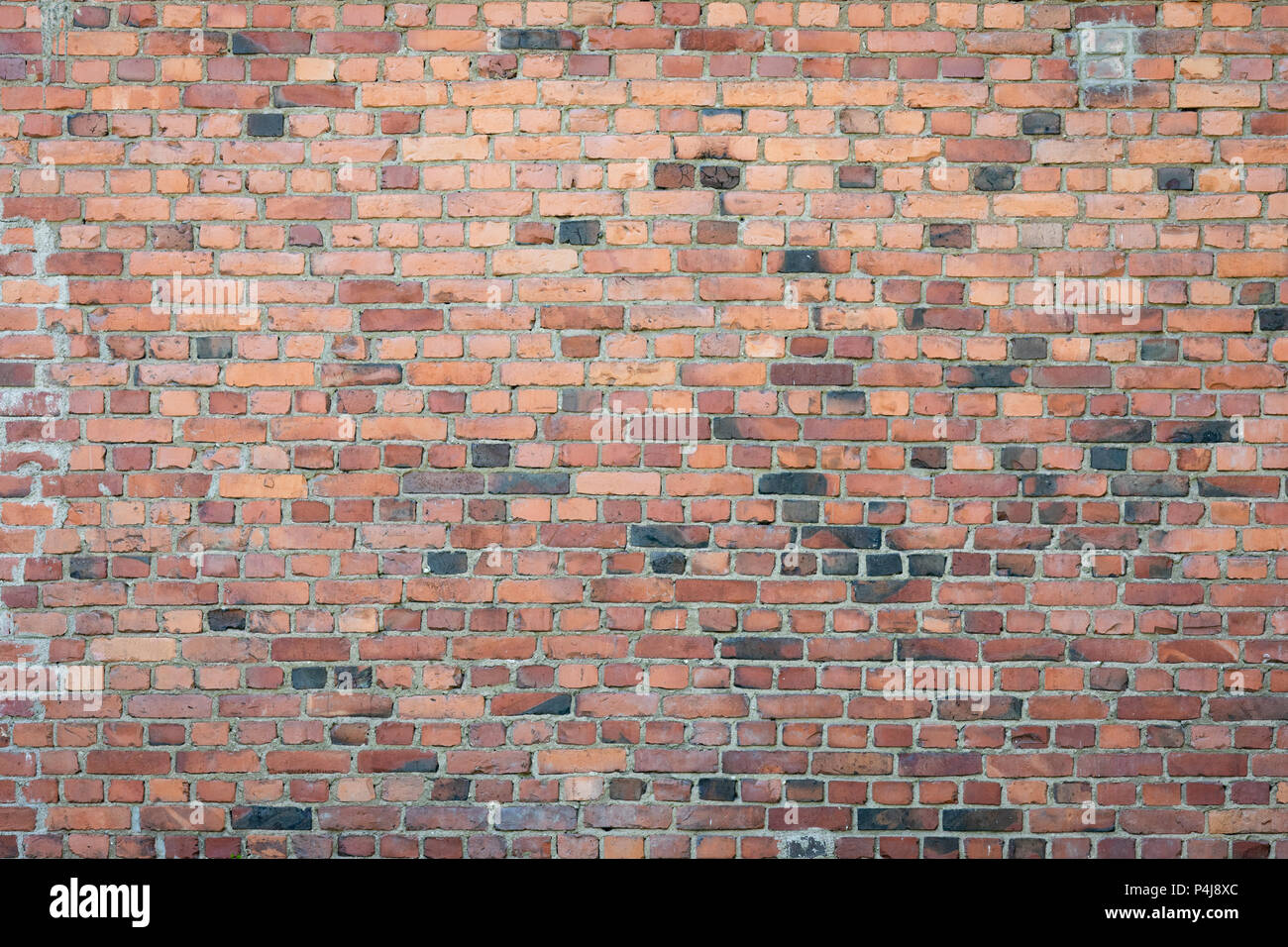 Old messy brick wall texture background exterior Stock Photo - Alamy