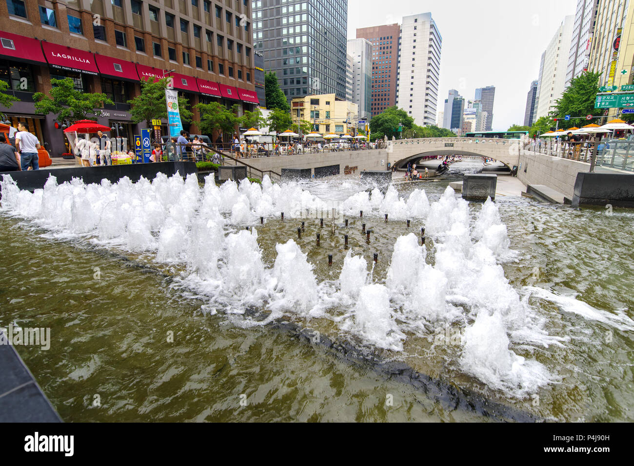 Seoul , South Korea : Jun 17, 2018 Citizens resting in the cheonggye ...