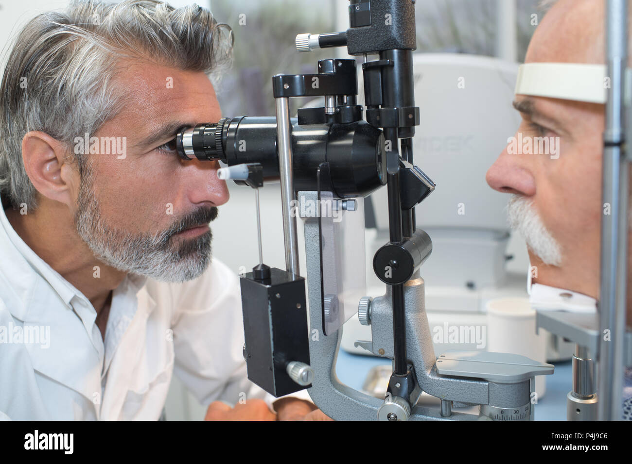 Optical examination hi-res stock photography and images - Alamy