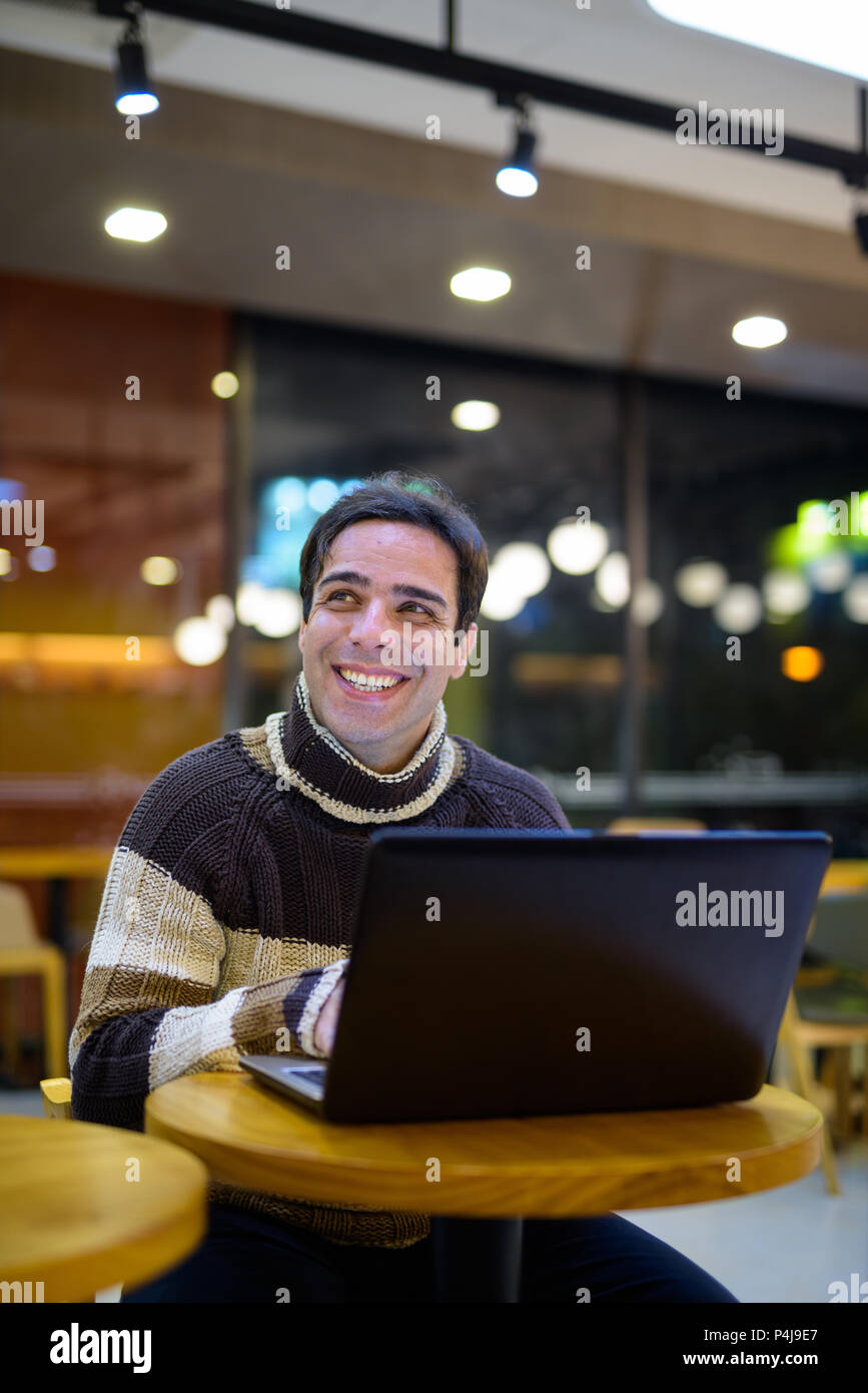 Man thinking with laptop hi-res stock photography and images - Alamy