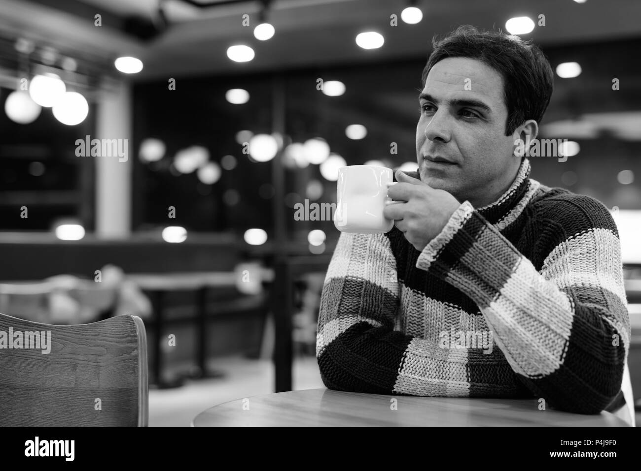 Handsome guy drinking coffee Black and White Stock Photos & Images - Alamy