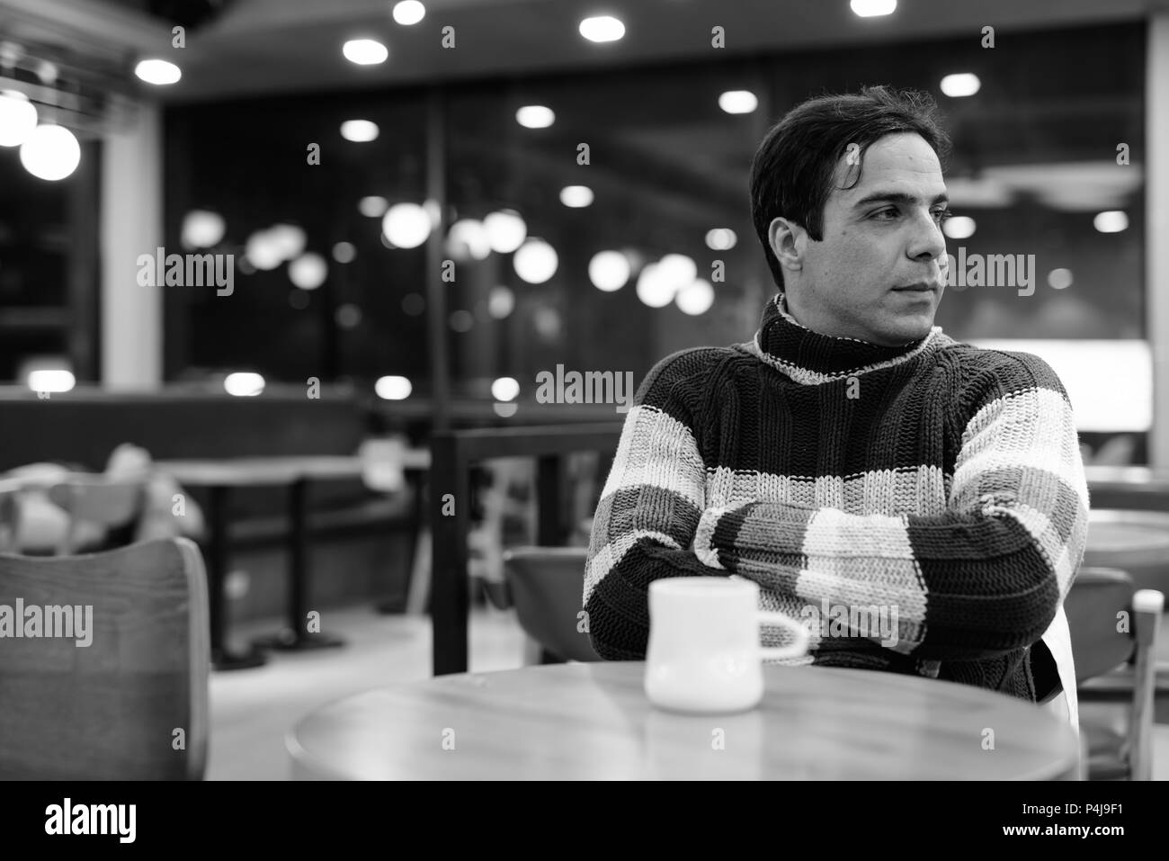 Person in coffee shop Black and White Stock Photos & Images - Alamy