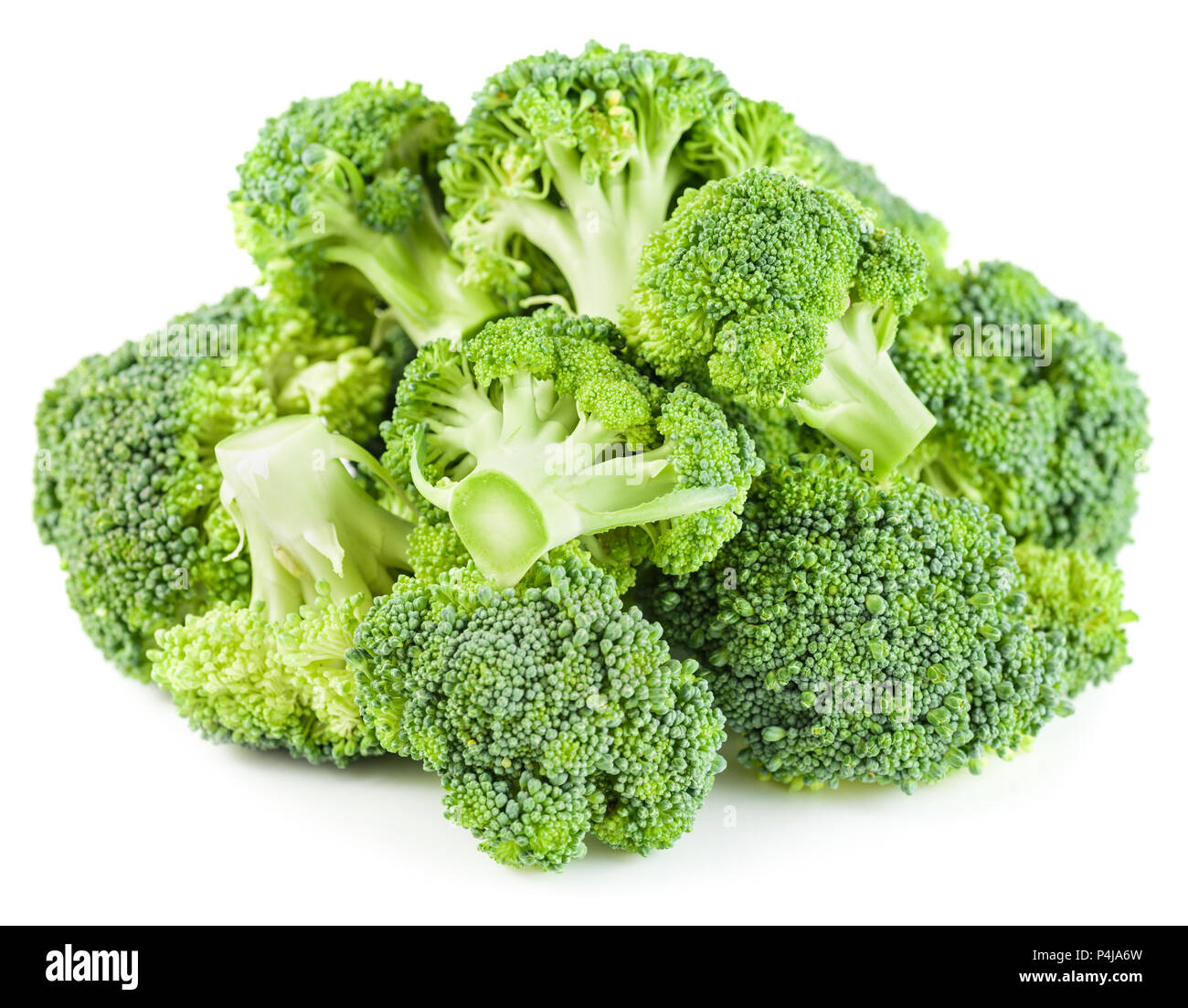 Pile of raw broccoli vegetable isolated on white background Stock Photo ...