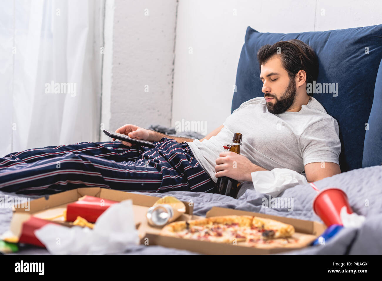 Remote control beer beverage hi-res stock photography and images - Alamy