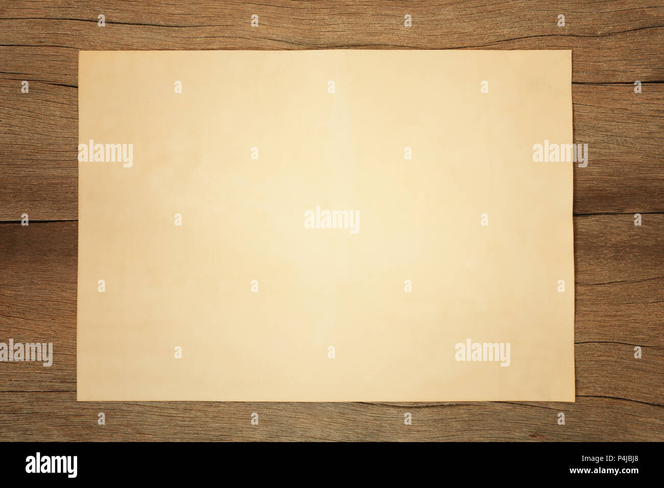 Old blank paper on vintage wooden floor and have copy space for design ...