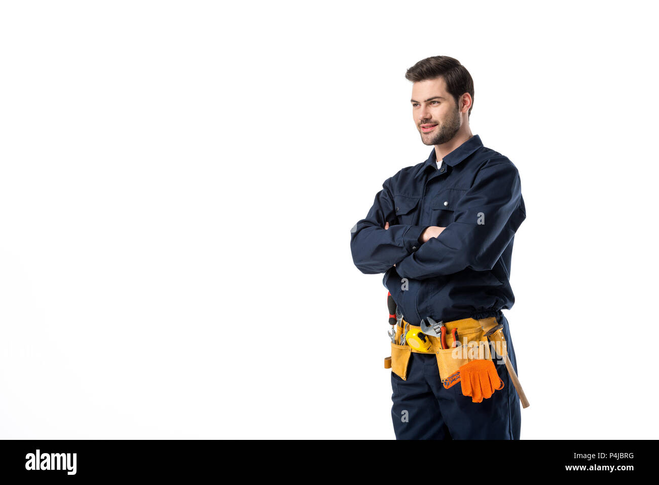 side view of plumber in uniform with arms crossed isolated on white ...