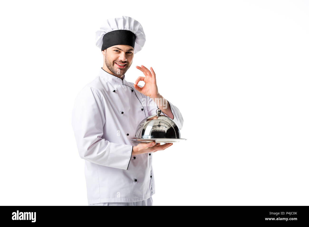smiling chef with serving tray showing ok sign isolated on white Stock ...