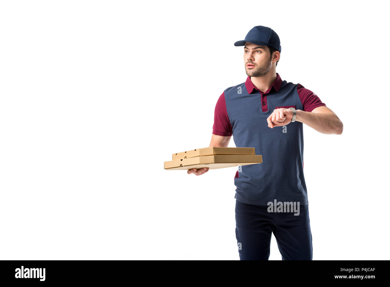 portrait of late delivery man with cardboard pizza boxes isolated on ...