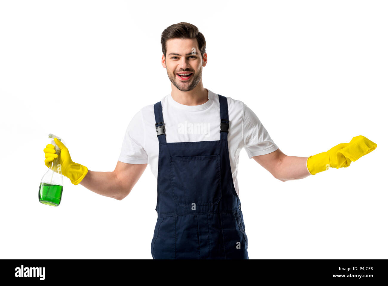portrait of smiling cleaner in rubber gloves with cleanser and rag in ...