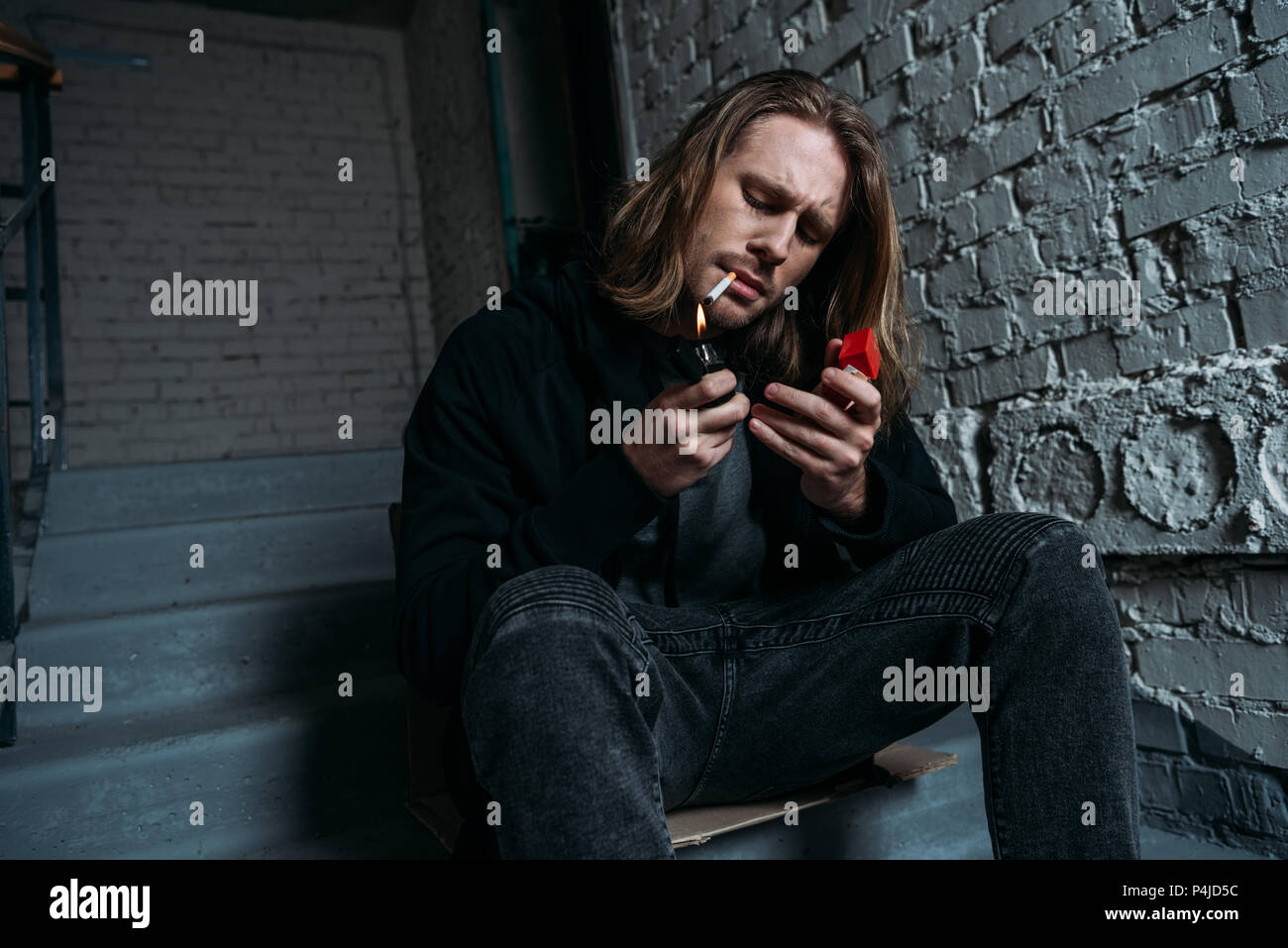 Sad man smoking caucasian hi-res stock photography and images - Alamy