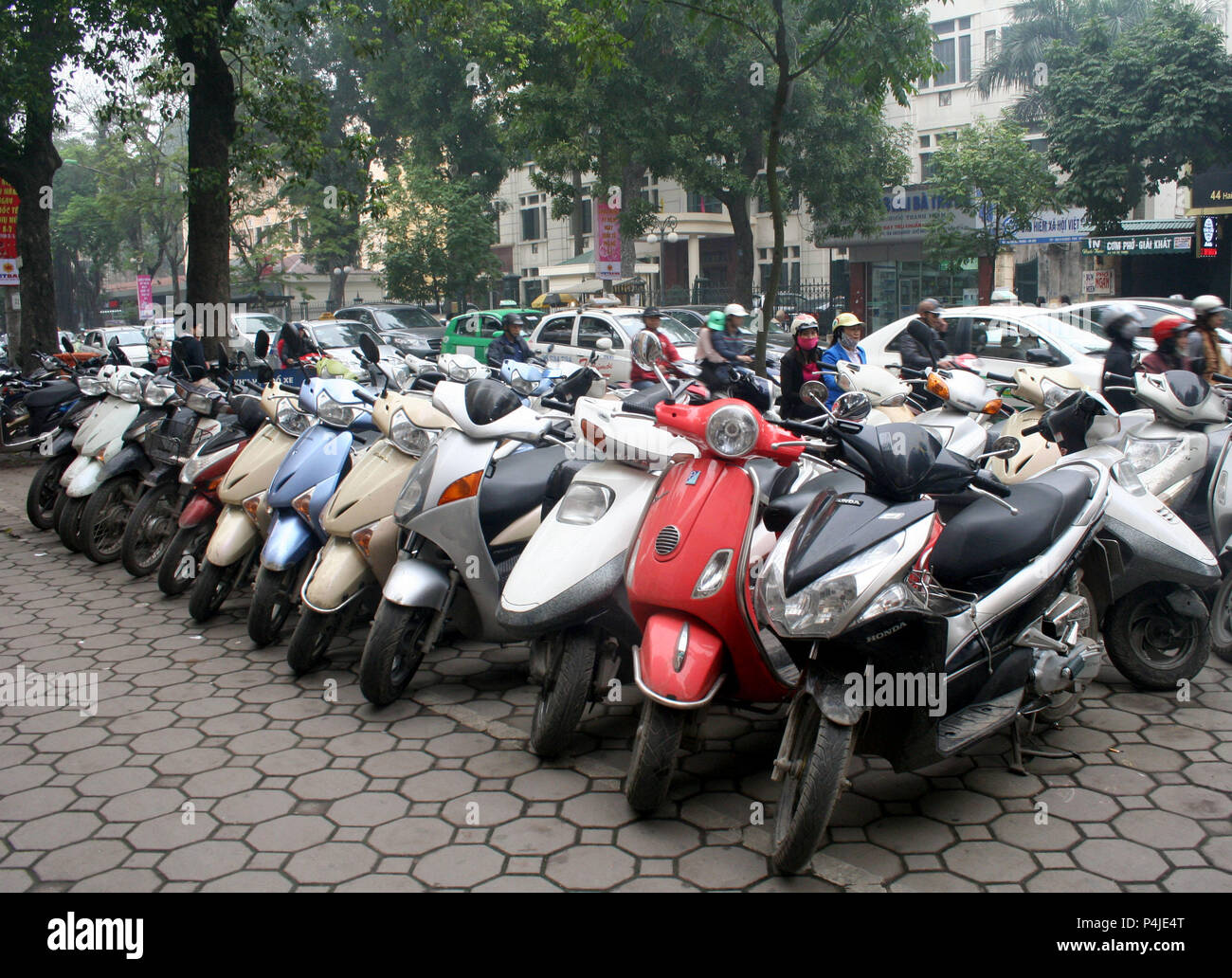 Different Coloured Mopeds Parked Together in Hanoi, Vietnam Stock Photo ...