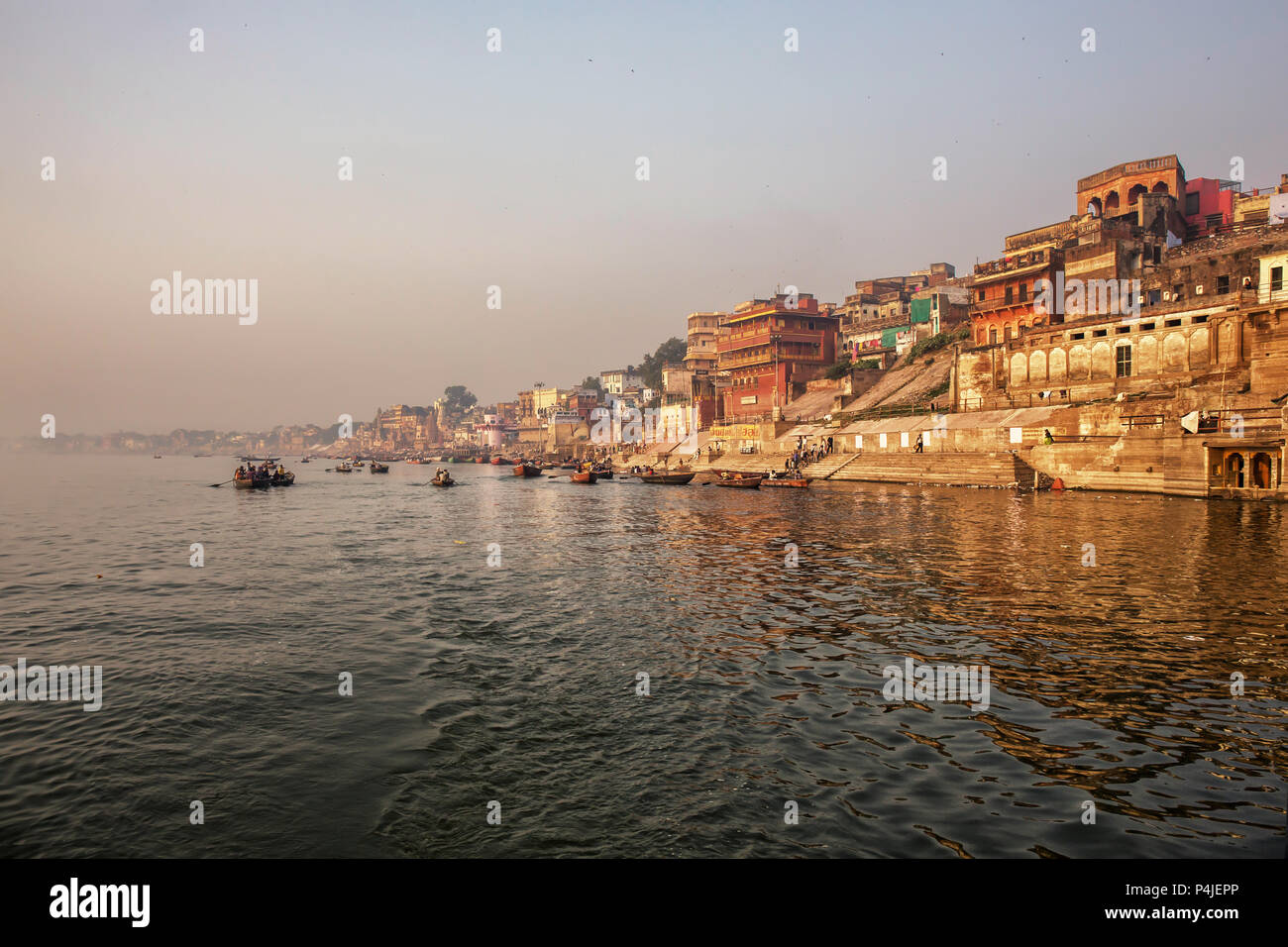 Varanasi Ganges river ghat with ancient architectural buildings and ...