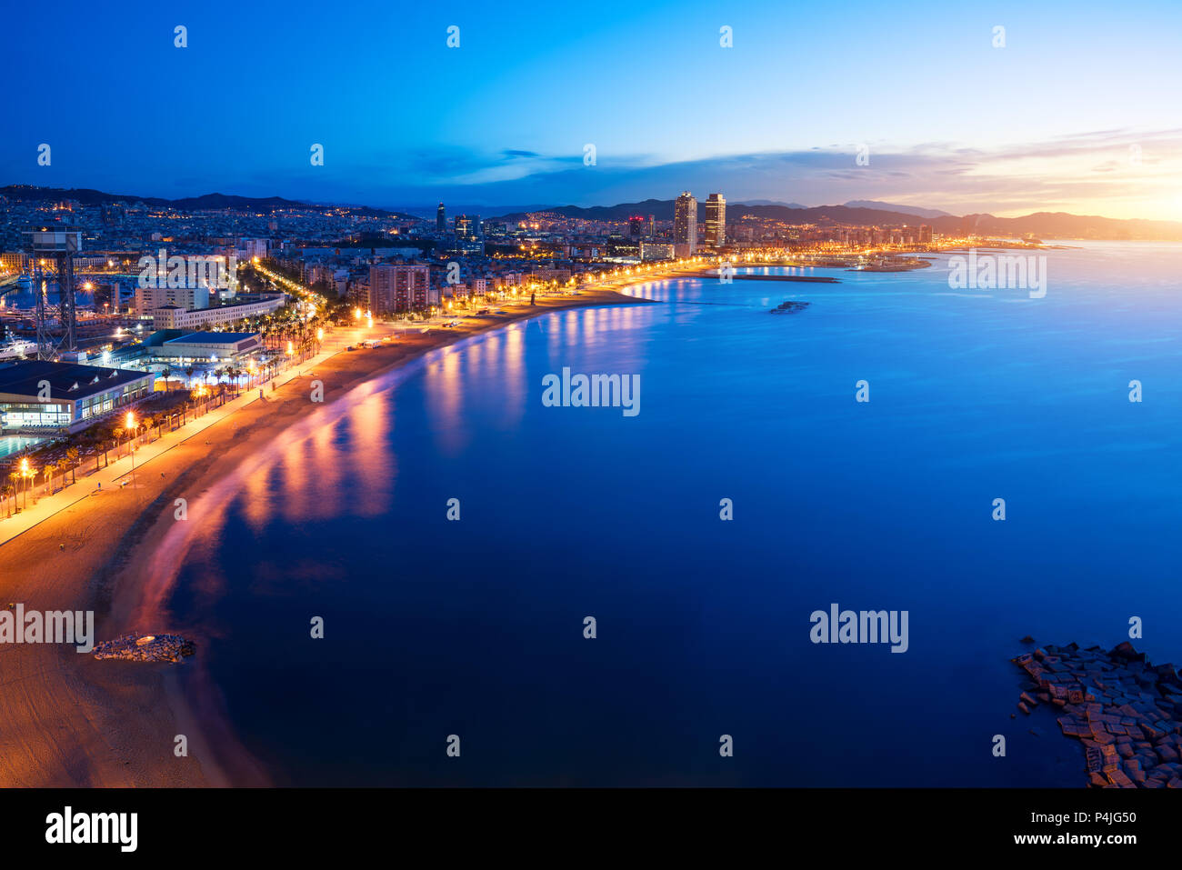 Aerial view of Barcelona Beach in summer night along seaside in ...