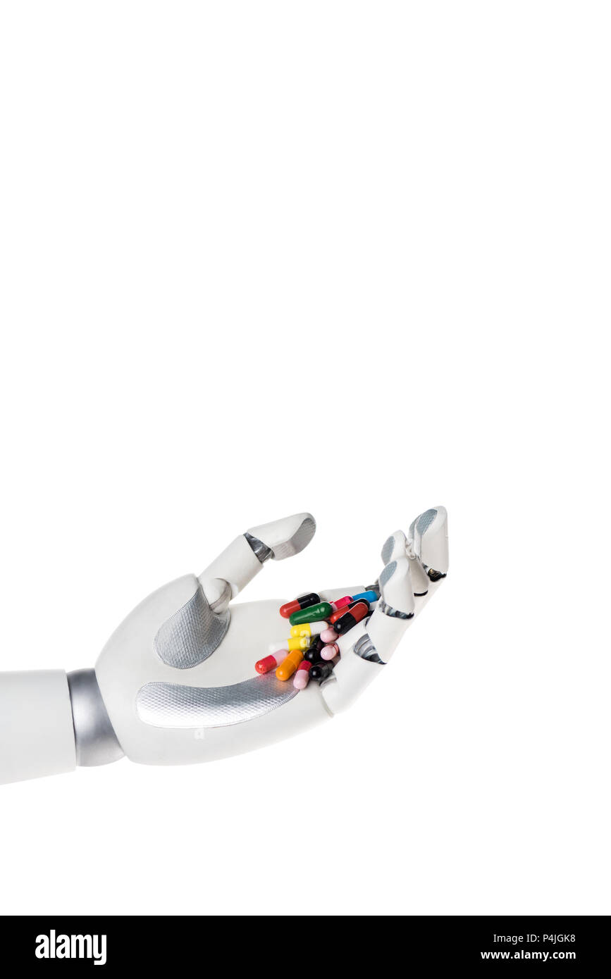 robot hand holding pills isolated on white Stock Photo - Alamy