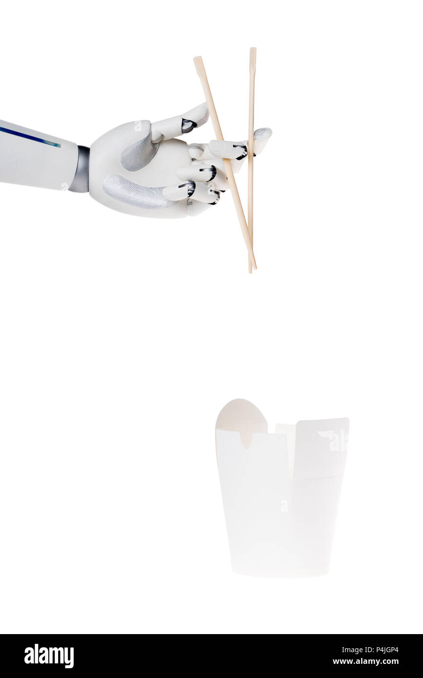 robot hand holding chopsticks above paper box with noodles isolated on ...