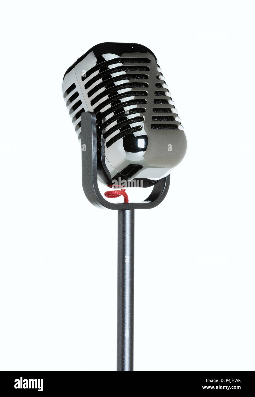 Vintage silver microphone isolated on white background Stock Photo - Alamy