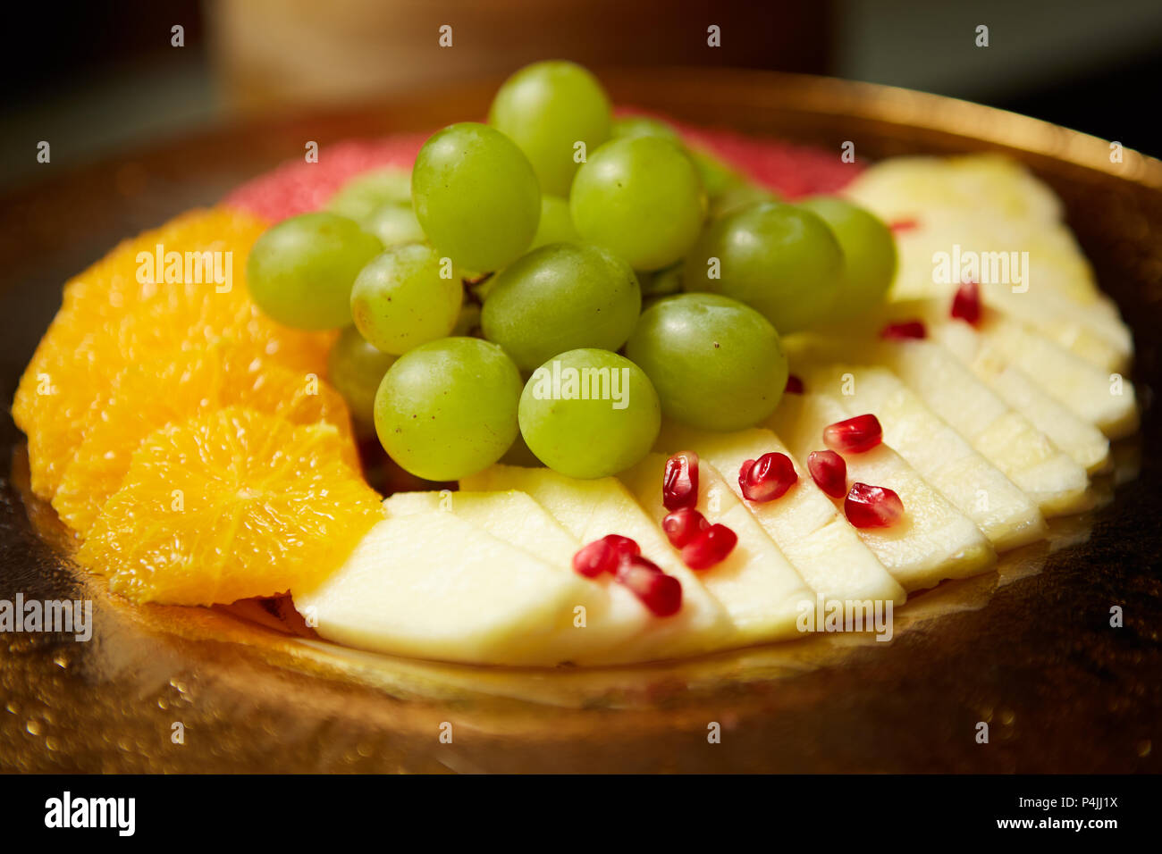 Plate with mixed fruits. Shallow dof Stock Photo - Alamy