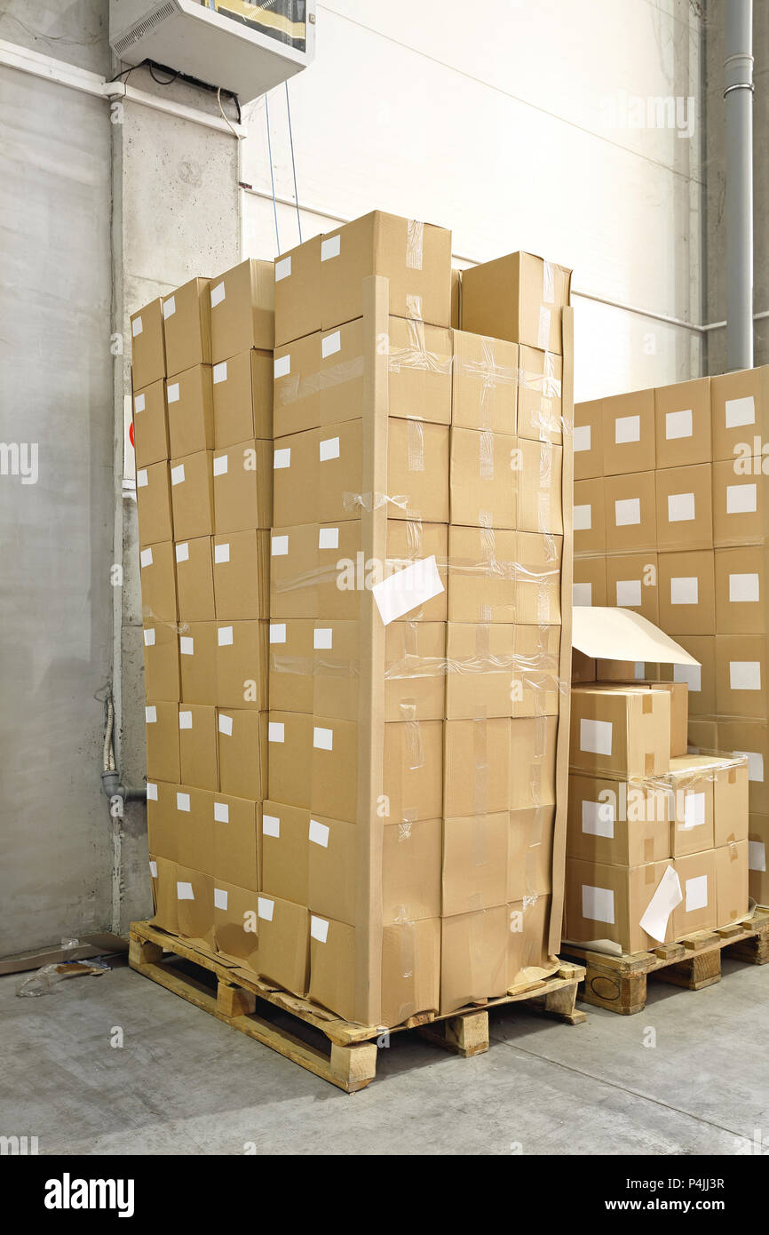 Boxes at Pallets in Warehouse Stock Photo - Alamy