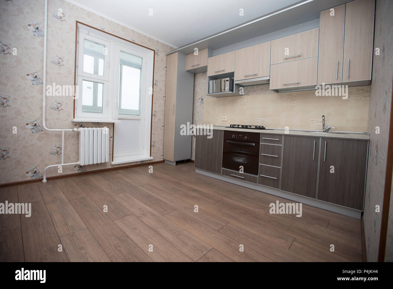 Empty kitchen in the apartment Stock Photo - Alamy
