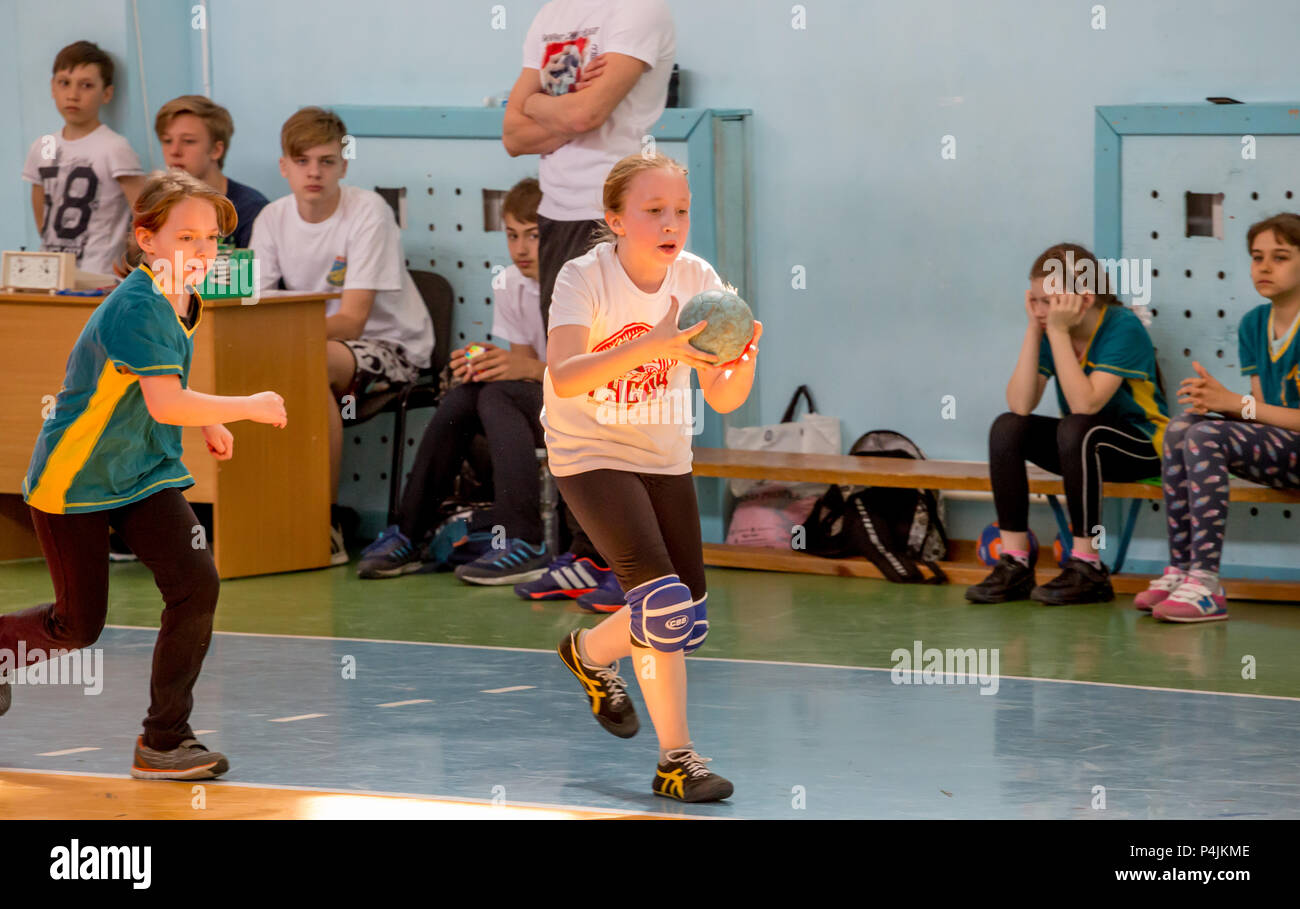 Russia, Vladivostok, 04/28/2018. Kids play handball indoor. Sports and ...