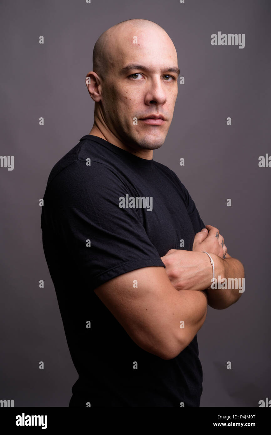Strong bald man hi-res stock photography and images - Alamy