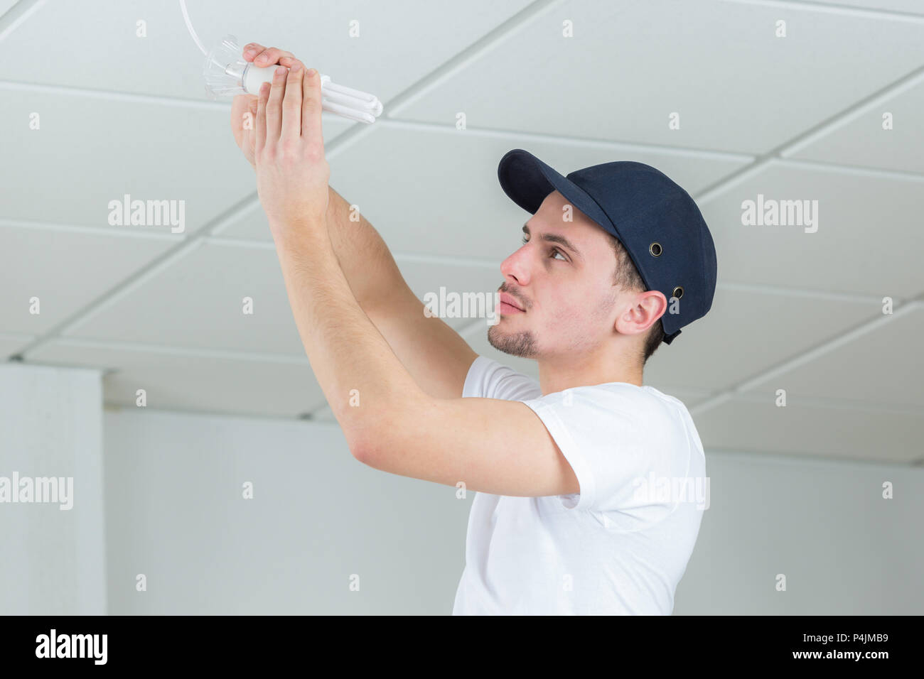 Young worker man installing led hi-res stock photography and images - Alamy