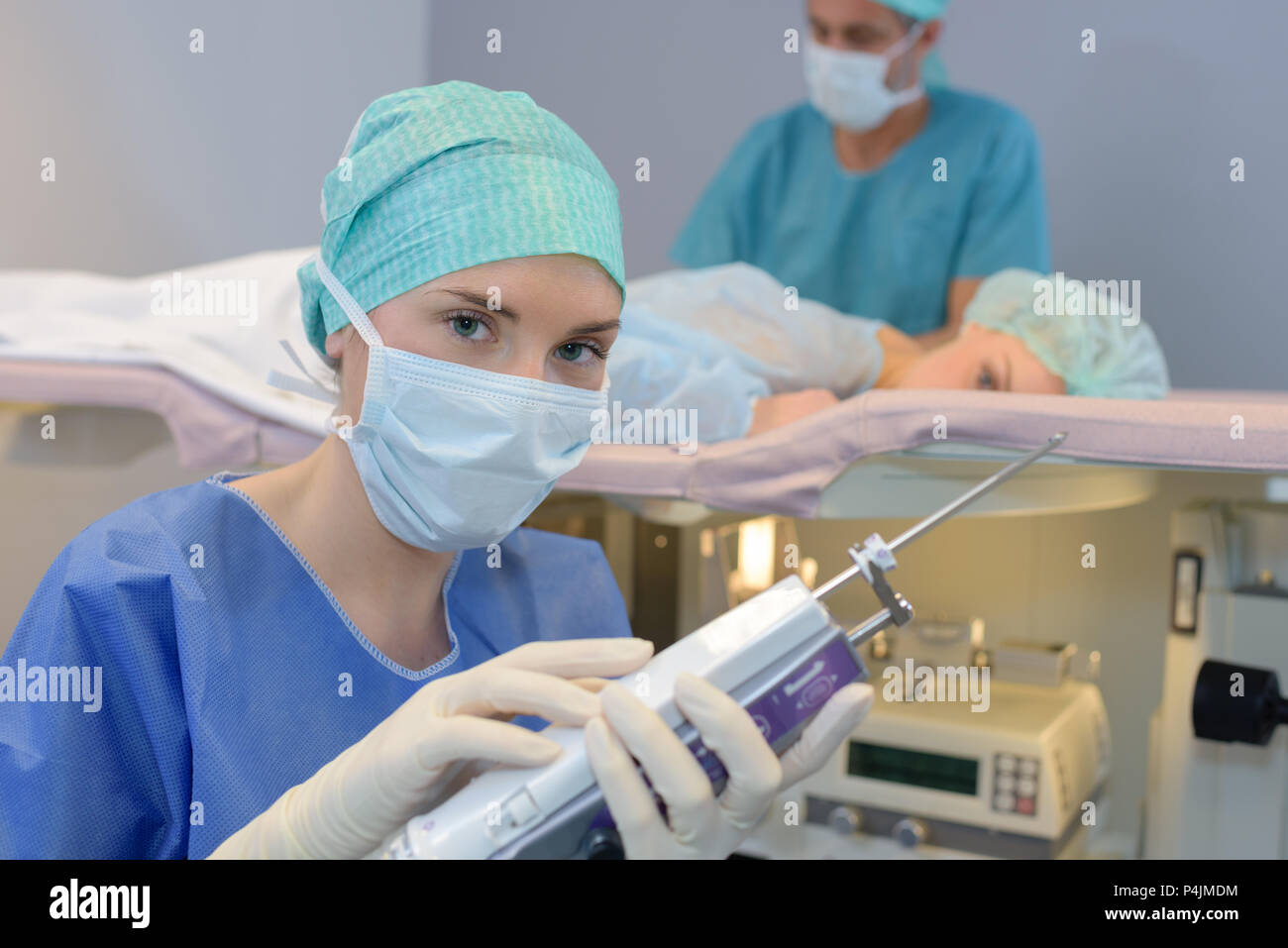 Nurse holding medial equipment Stock Photo - Alamy
