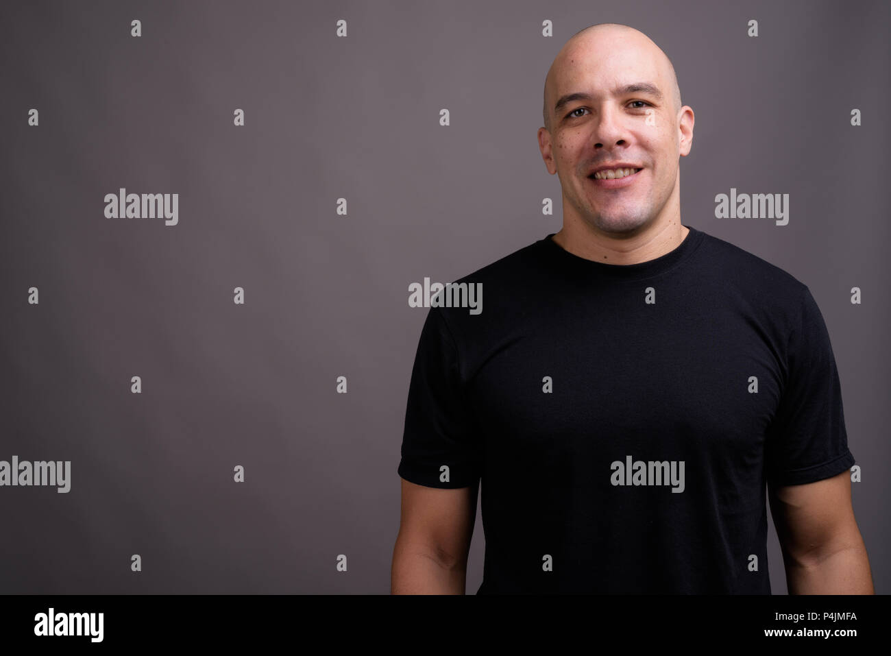 Strong bald man hi-res stock photography and images - Alamy