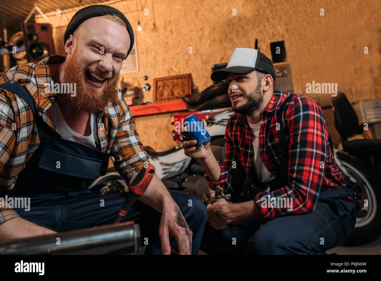 Mechanic laughing hi-res stock photography and images - Alamy