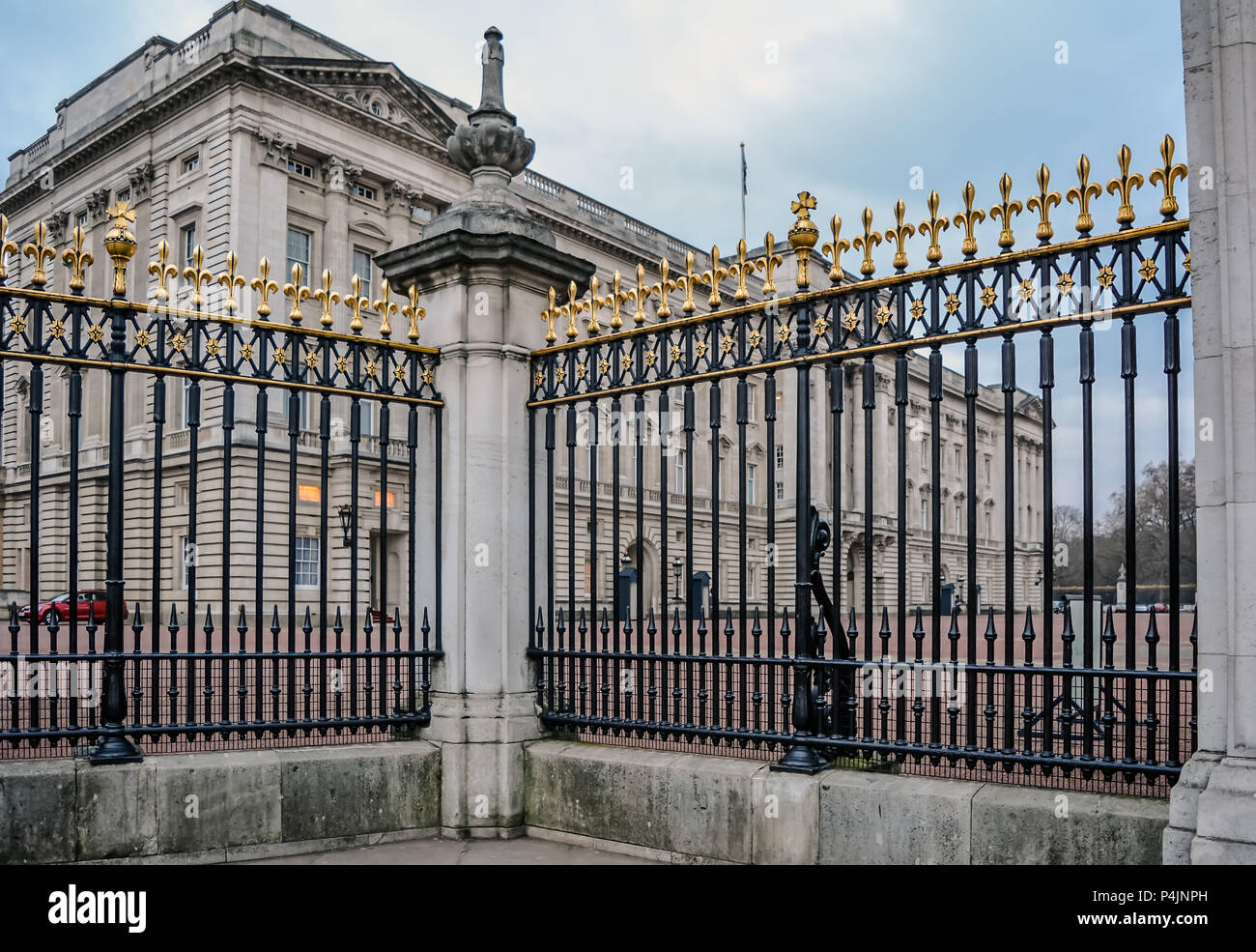 Part of the black cast-iron railings with gilded tips outside the ...