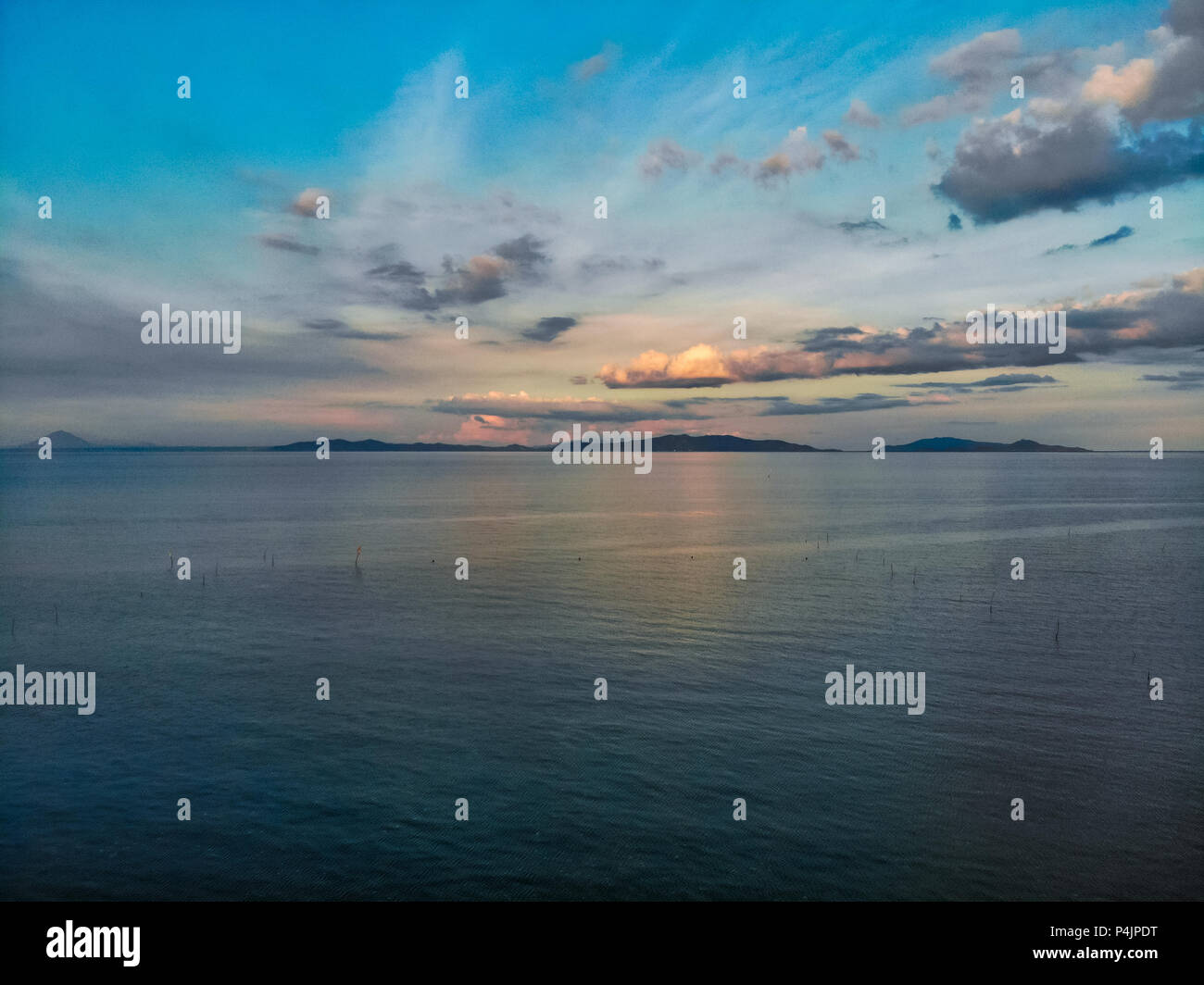 Aerial view of blue and yellow skies during twilight at Calatagan ...