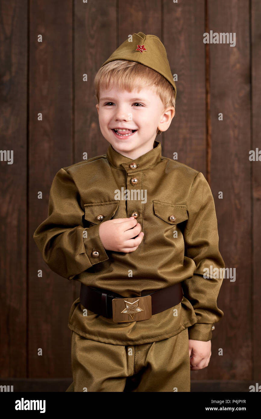 children are dressed as soldier in retro military uniforms Stock Photo ...