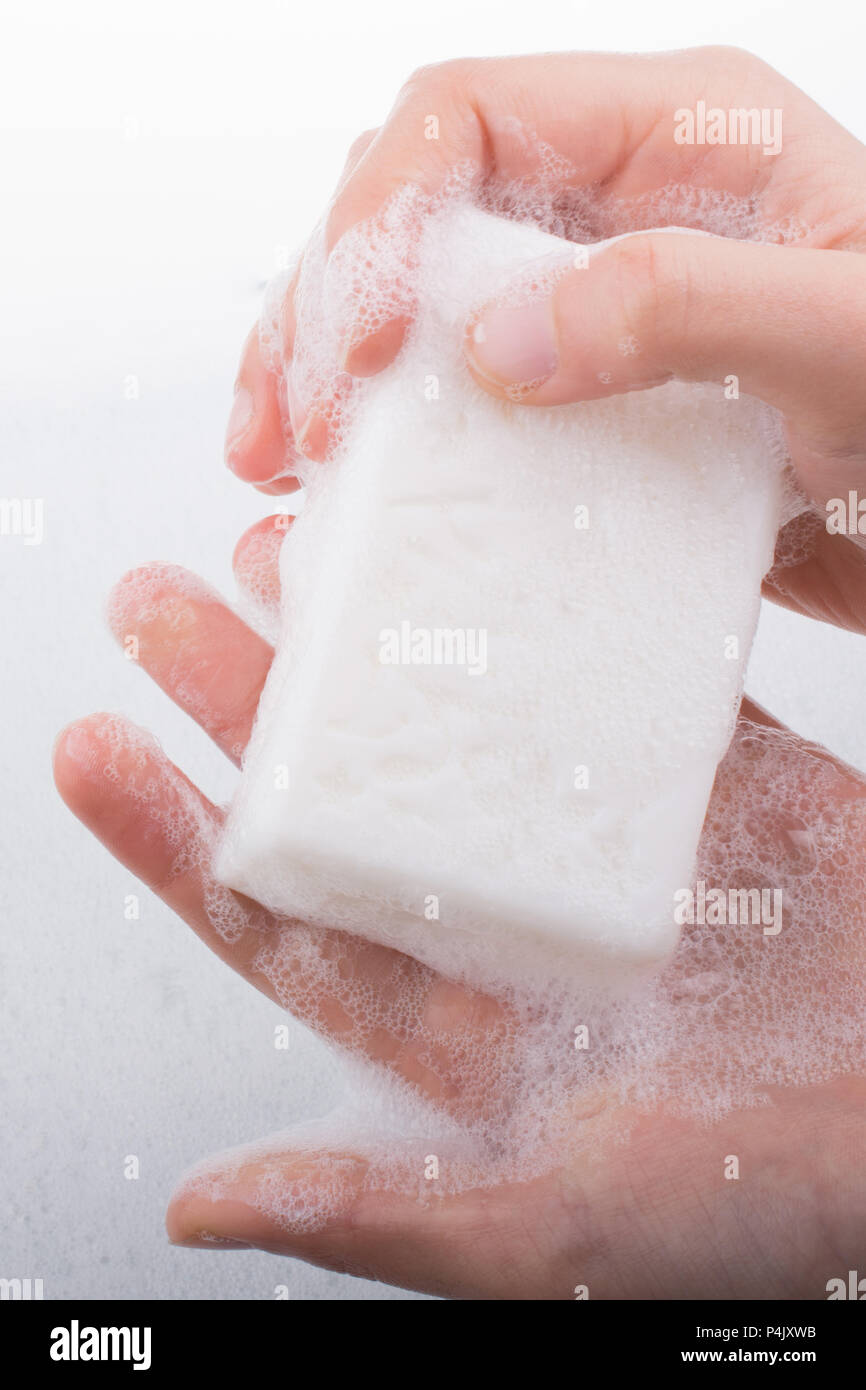 Hand washing and soap foam on a foamy background Stock Photo - Alamy