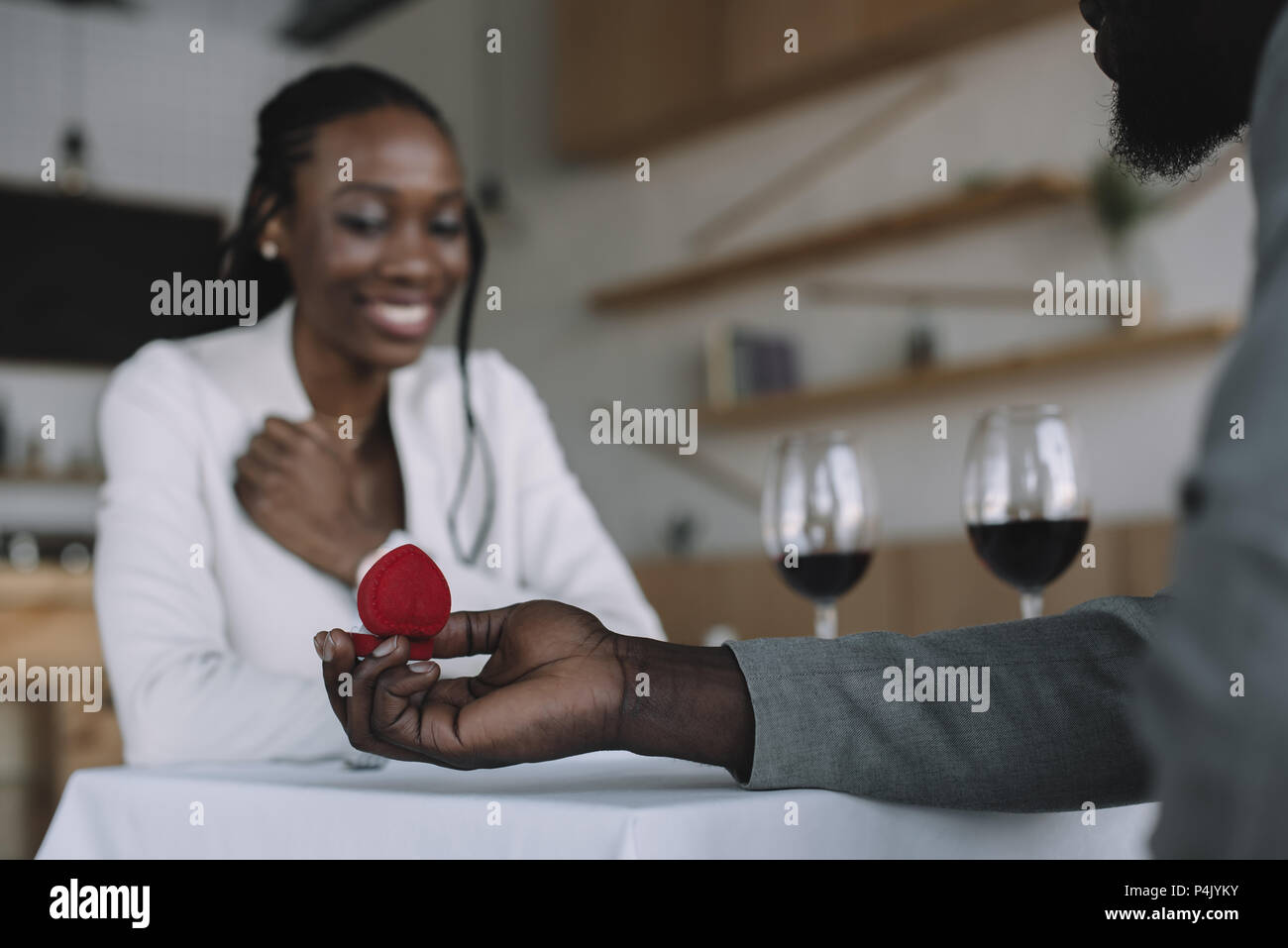Man proposing girlfriend during dinner hi-res stock photography and ...