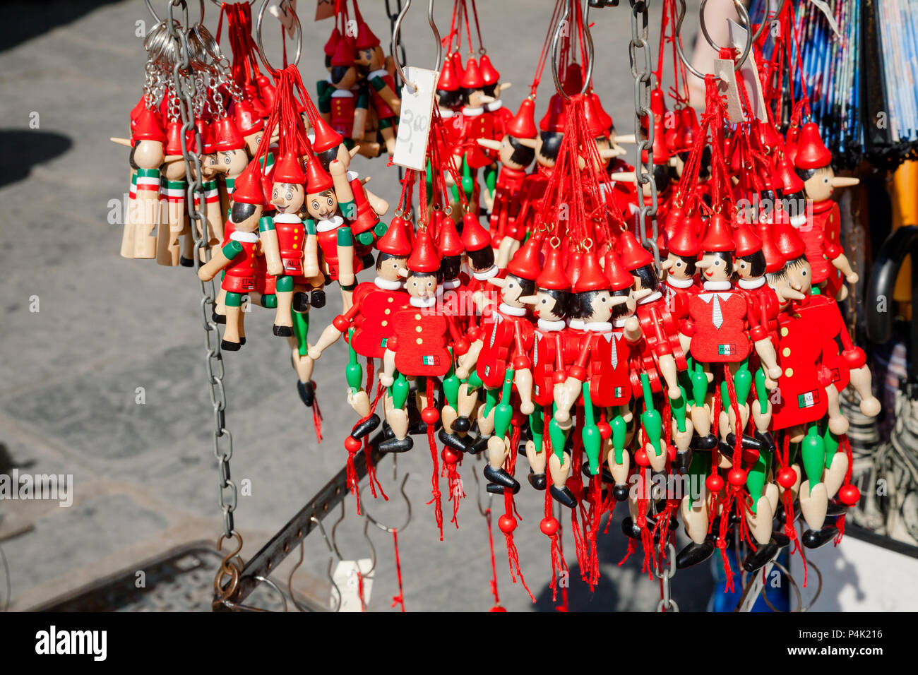 Street stall with traditional italian wooden Pinocchio toy souvenirs ...