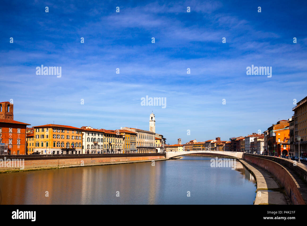 Pisa cityscape with medieval waterfront buldings on Arno River ...