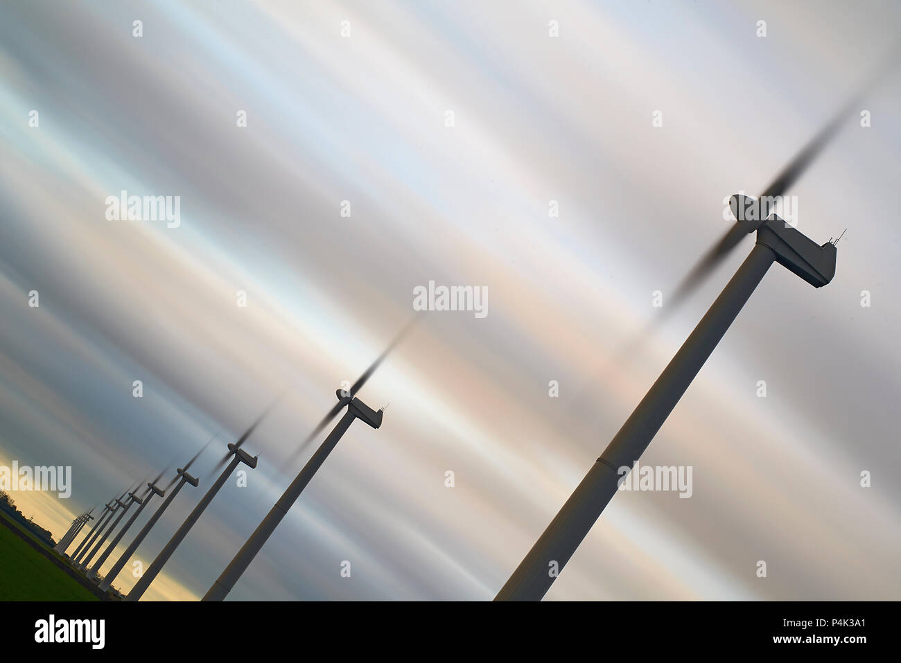 Long exposure of wind turbines with the movement of the clouds made ...