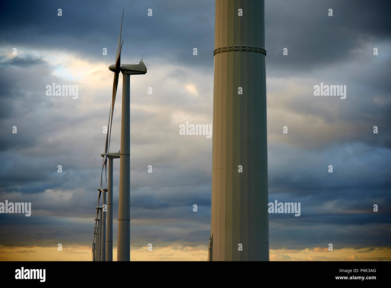 Stunning landscape of a huge windpark with wind turbines lining up in a ...