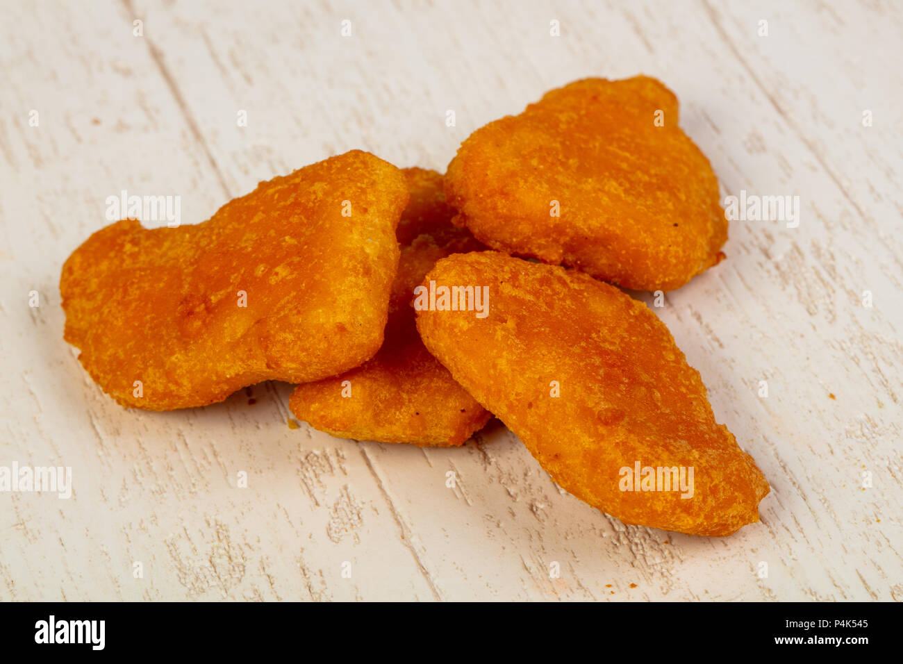 Crispy tasty golden chicken nuggets Stock Photo - Alamy
