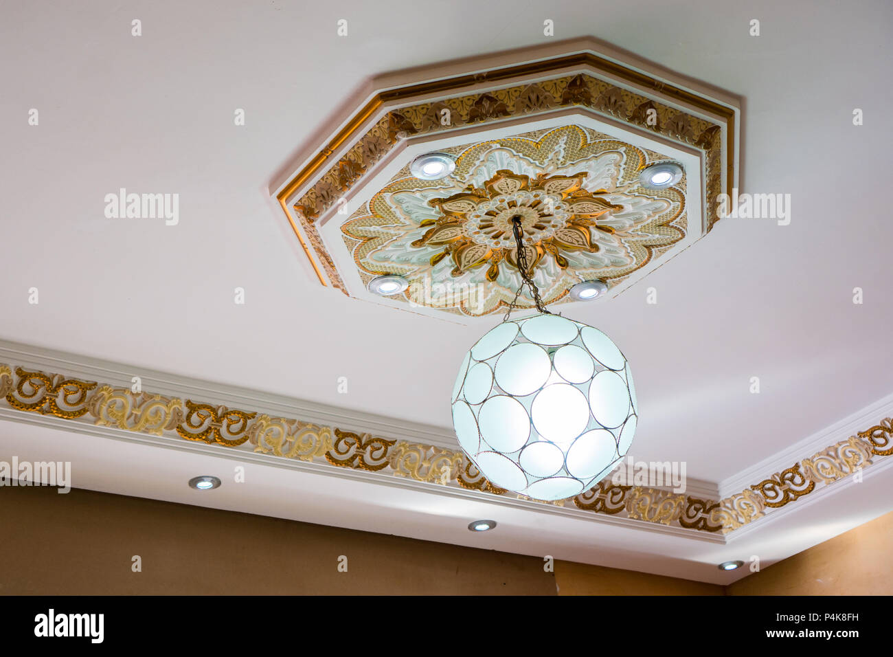 Luxury shiny chandelier on the ceiling decorating home interior Stock ...