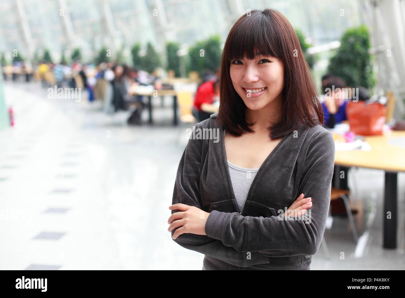 pretty young asian college student study in the library Stock Photo - Alamy