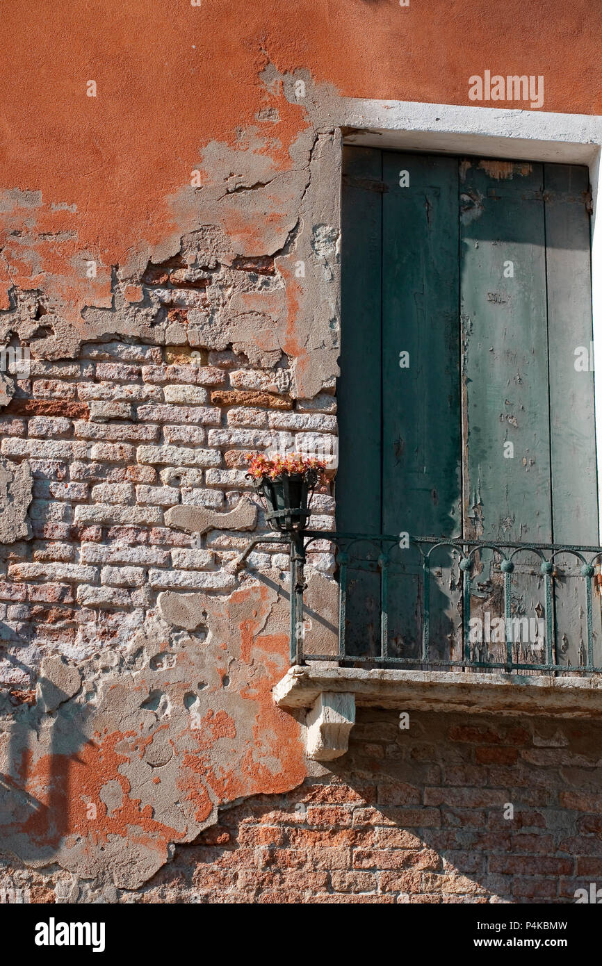 Shuttered window of the Pensione Seguso, overlooking the Rio di San Vio ...
