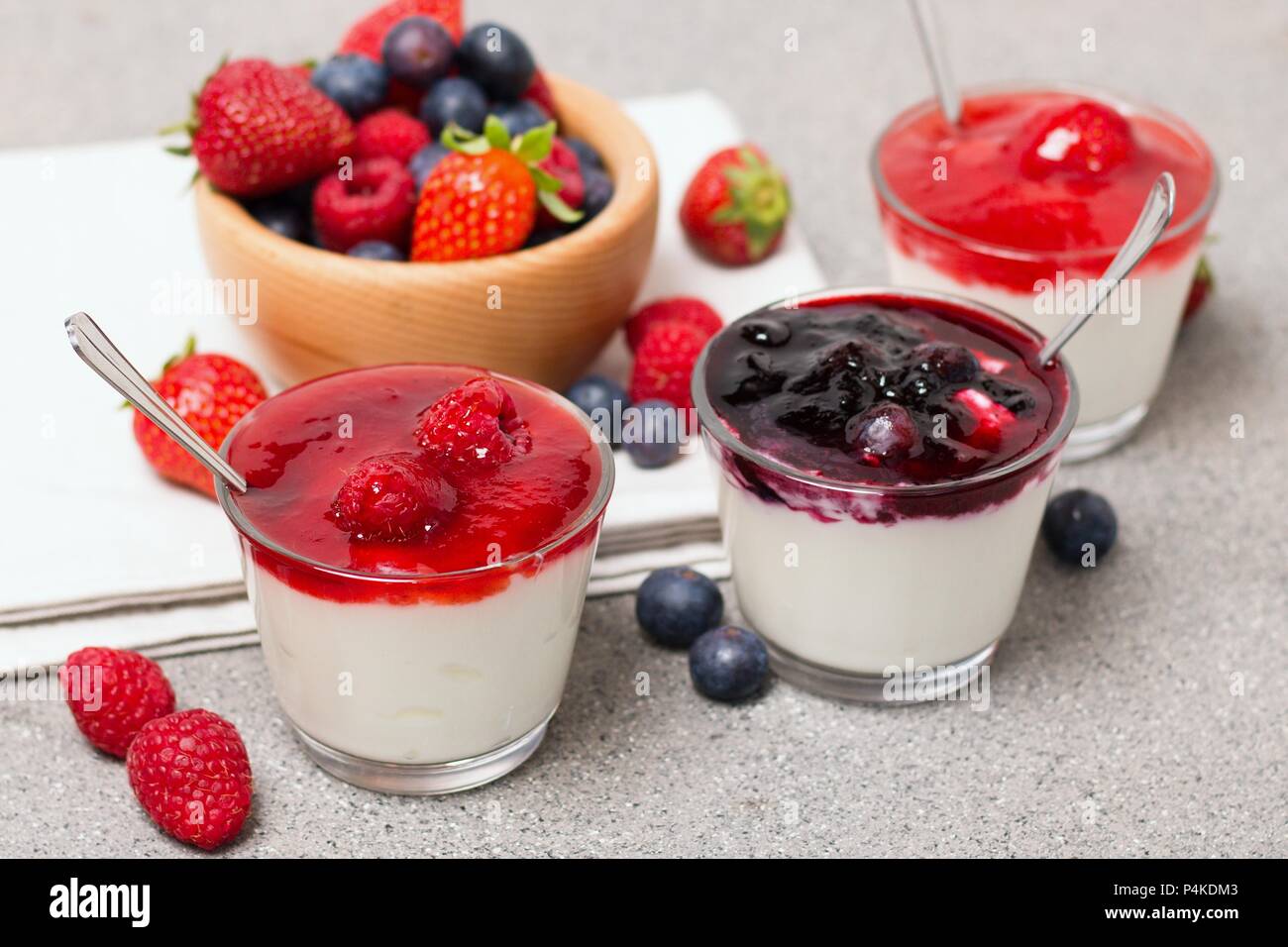 Yogurt with various forest fruit berries Stock Photo - Alamy
