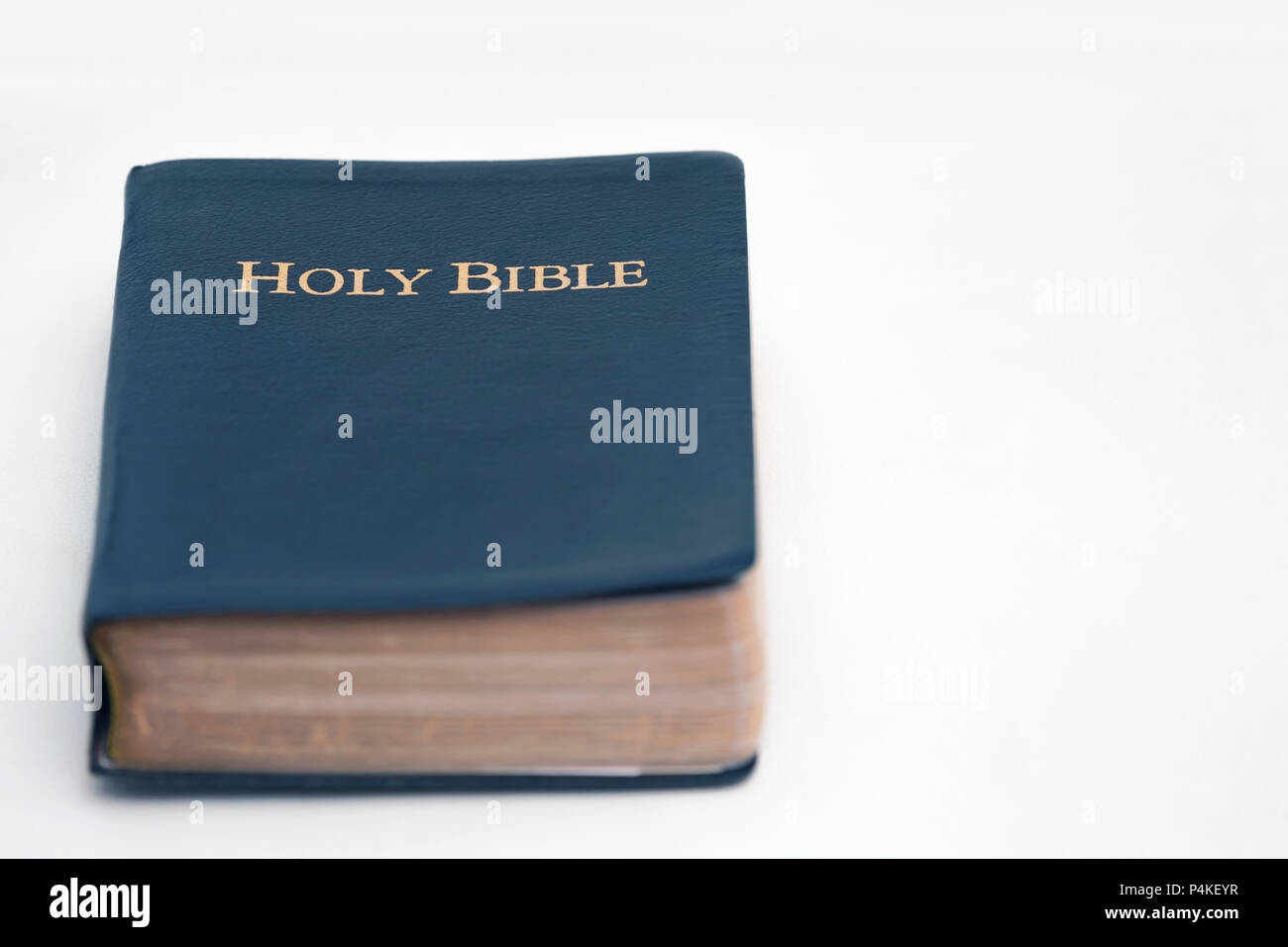 Top View of Holy Bible on White Platform Stock Photo - Alamy