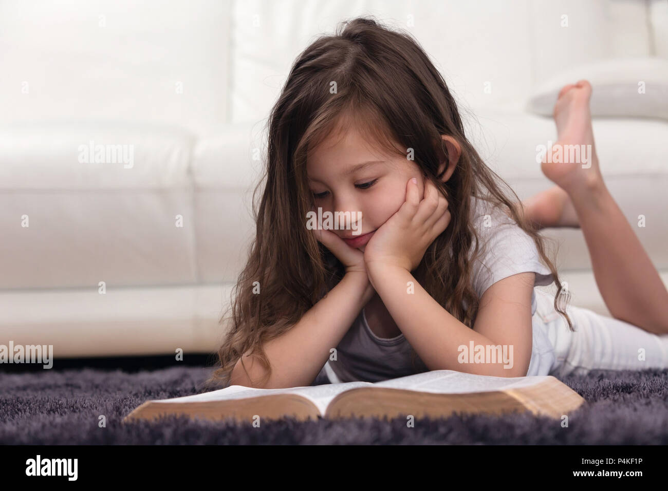 Young Child Learning the Word of God Stock Photo - Alamy