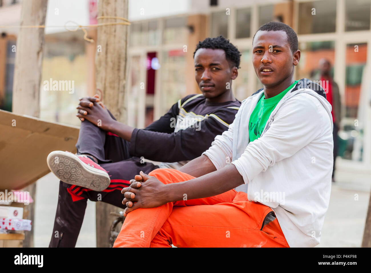 Addis Ababa, Ethiopia, January 27, 2014, Two young men relaxing on the ...
