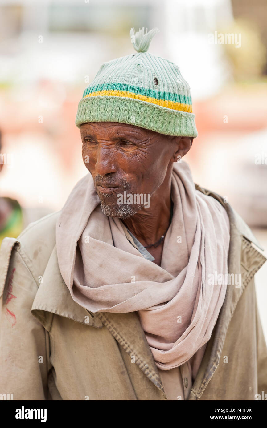 Addis Ababa, Ethiopia, January 27, 2014, Old African man with a green ...